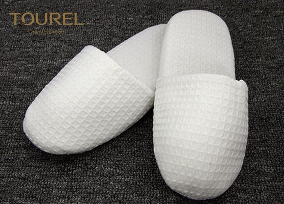 China EVA Sole Waffle Indoor Disposable Hotel Slippers With Custom Logo supplier